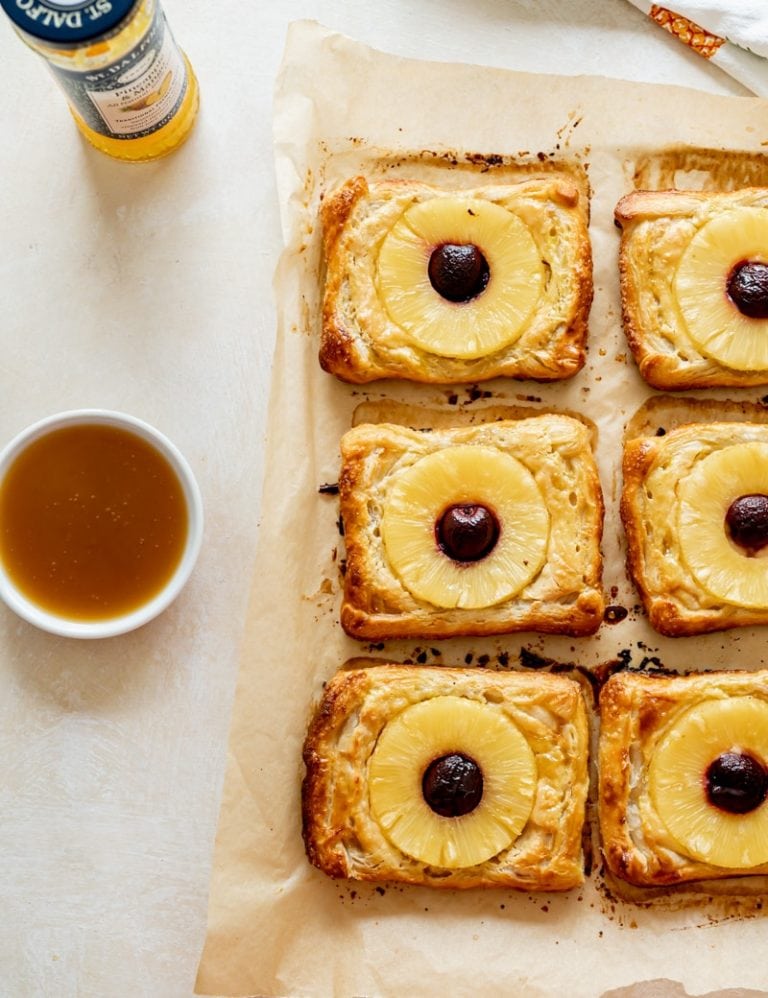 Tropical Pineapple Puff Pastry Tarts with Pineapple Rum Sauce