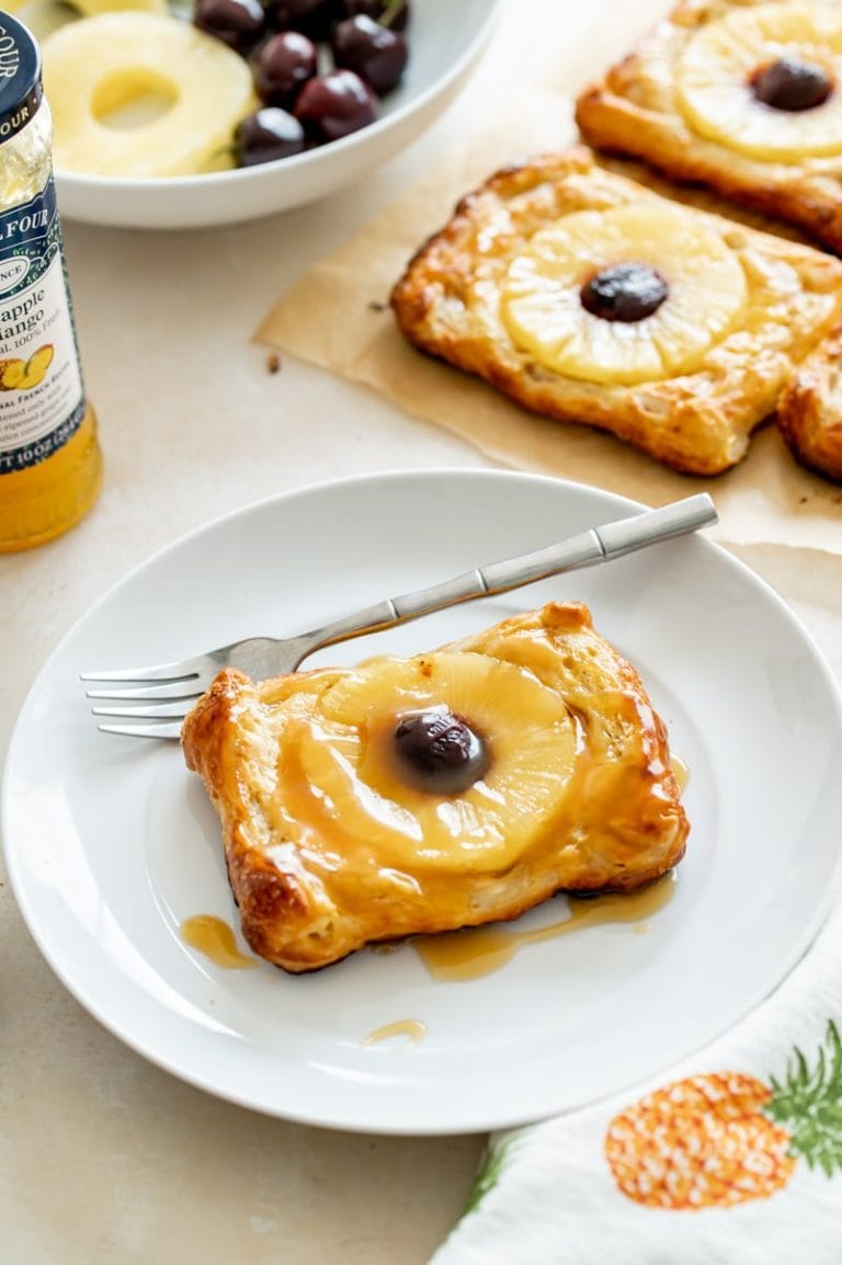 Tropical Pineapple Puff Pastry Tarts with Pineapple Rum Sauce